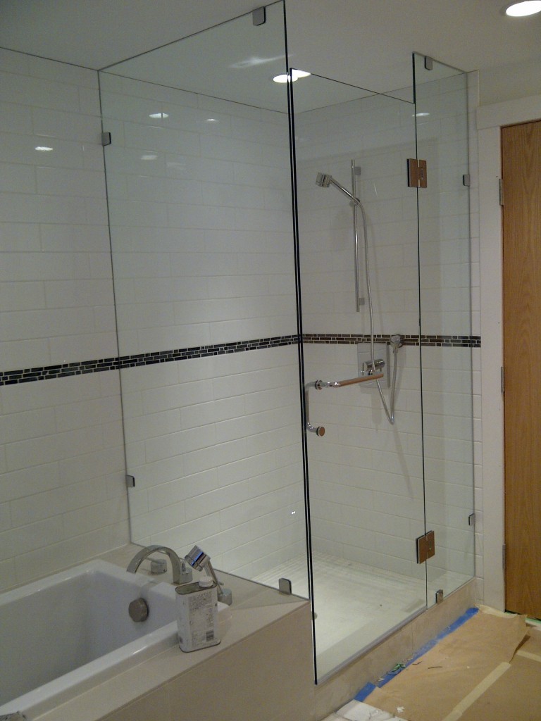 Custom bathroom glass shower system. Thick tempered glass walls and ...