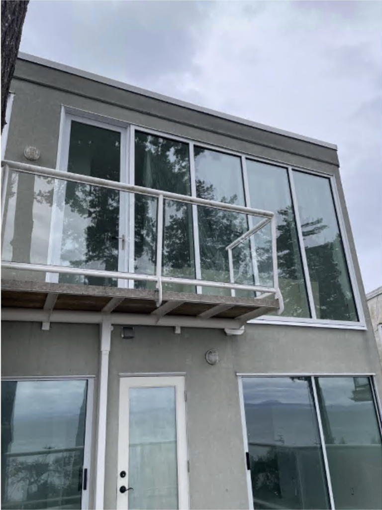 Folding Glass Doors and Floor-to-Ceiling Windows Installation for an ...